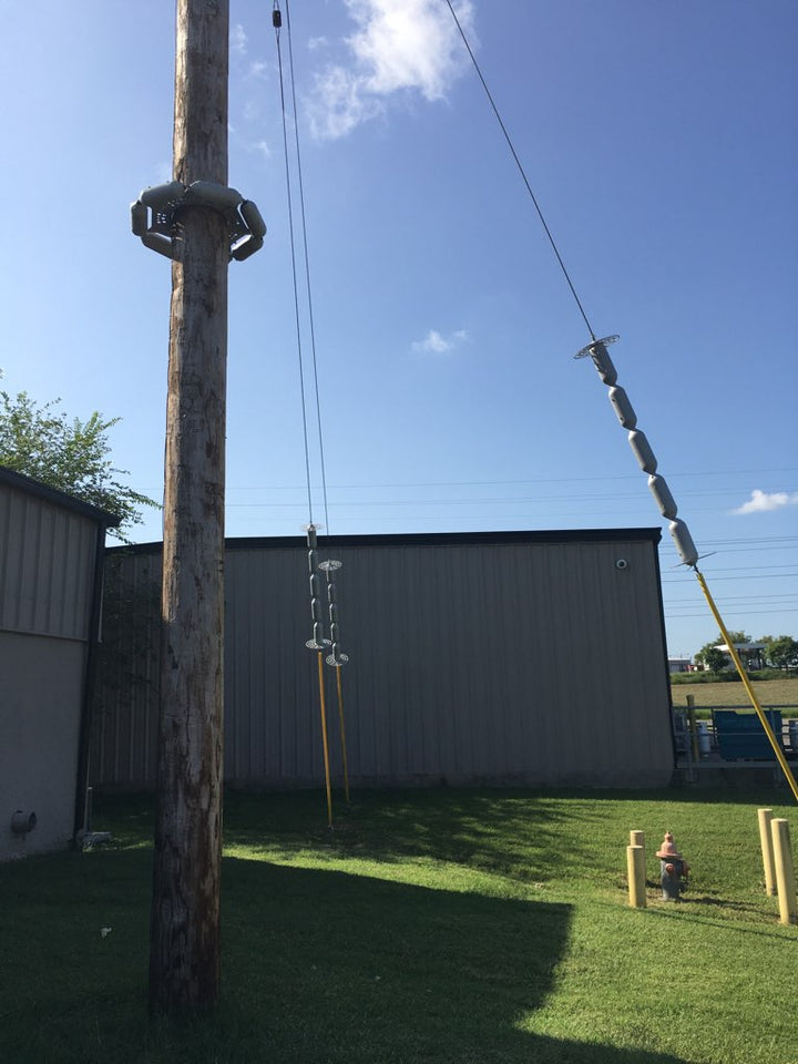 Utility Pole Guards Prevent Squirrel Access to Power Lines